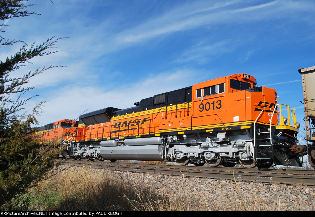 BNSF 9013 and BNSF 5759 (#2 Unit) wait to head westbound pulling a Empty Coal train towards BNSF ...